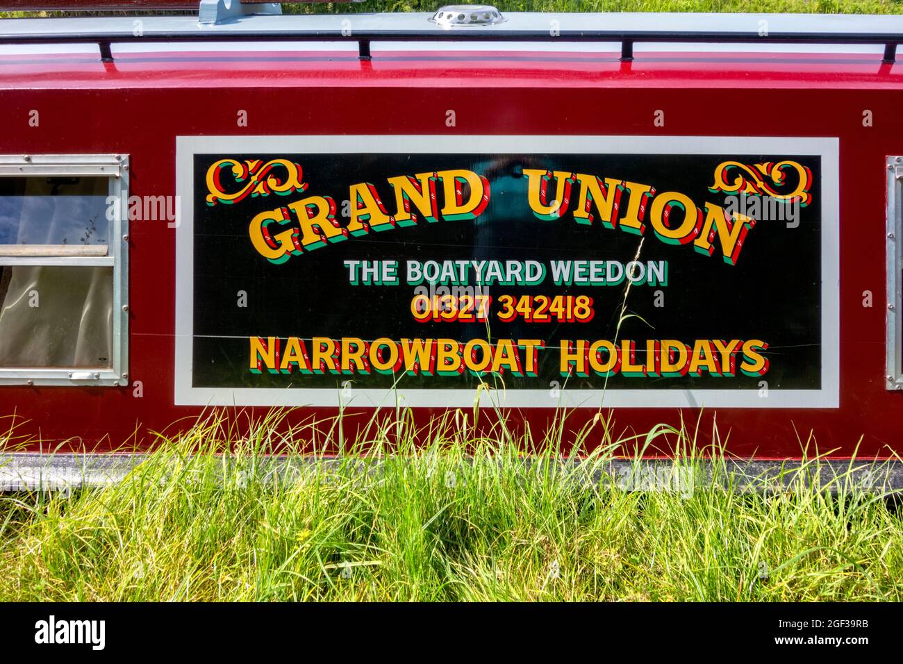 Narrowboat Grand Union Canal Buckinghamshire UK advertising sign Stock ...