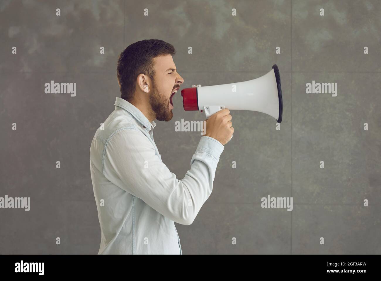 Man shouting megaphone hi-res stock photography and images - Alamy