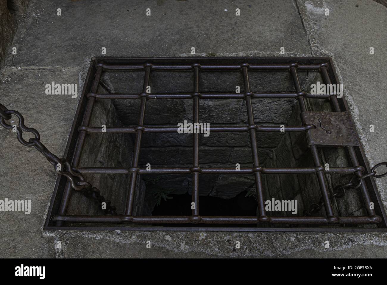 High angle shot of a steel cage window in the castle Stock Photo - Alamy