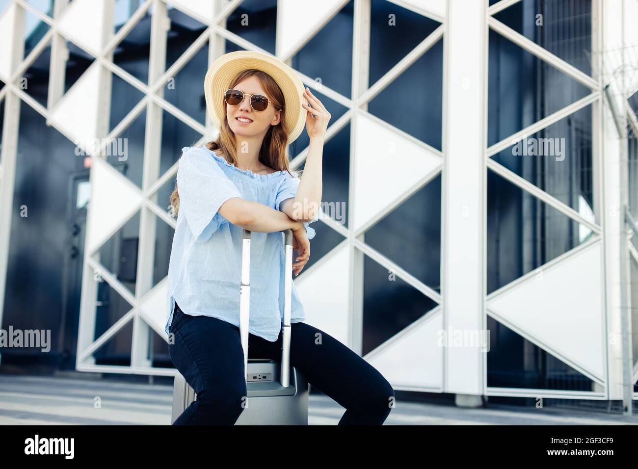 Cheerful young woman dressed hi-res stock photography and images - Alamy