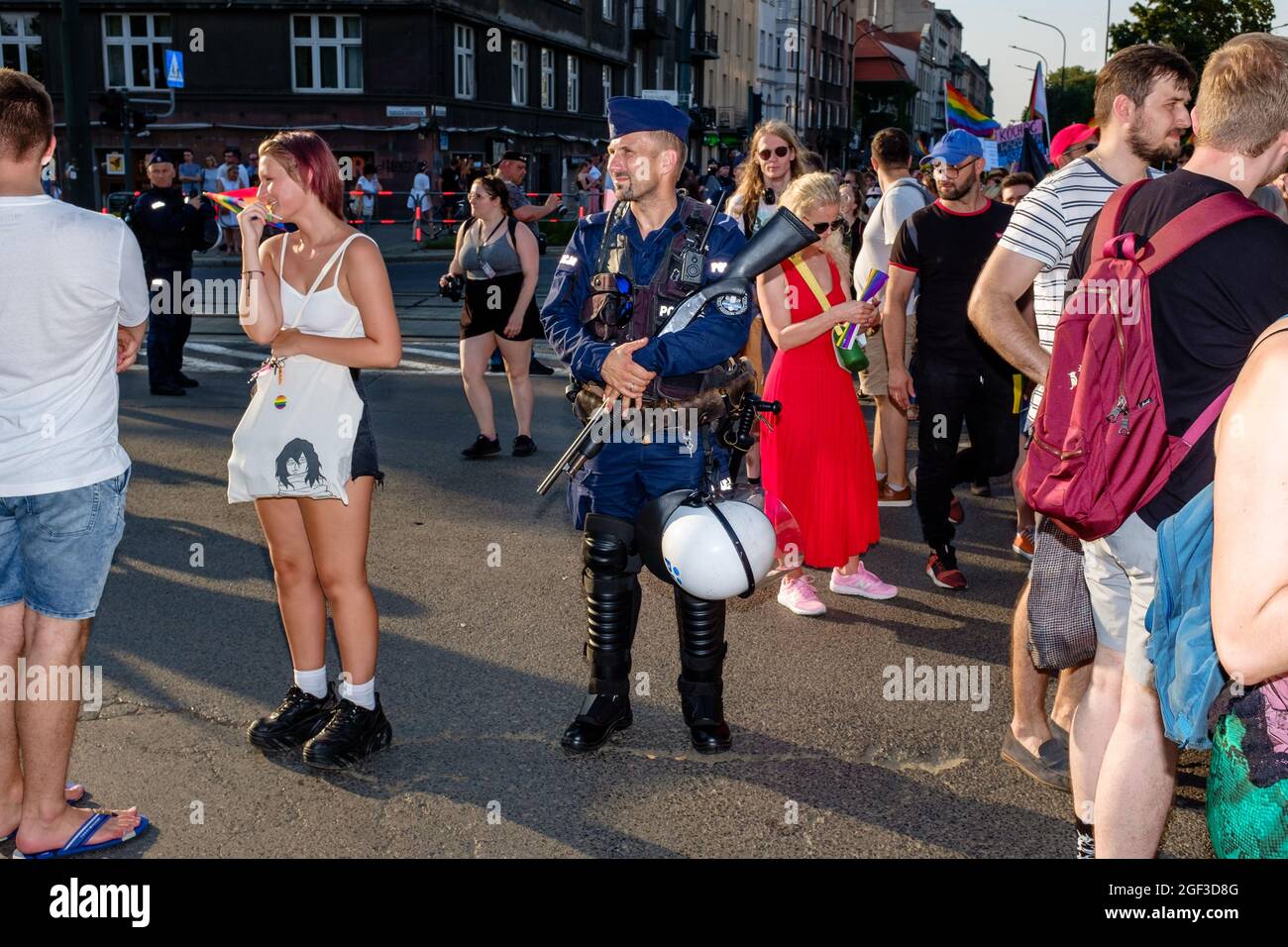 A riot policeman holding a rubber bullet gun is seen during the march ...