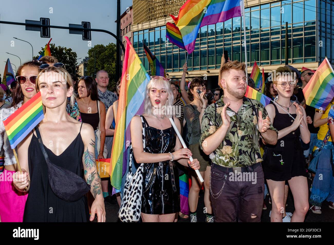 Members of Polish LGBTQ community are seen with rainbow flags during ...