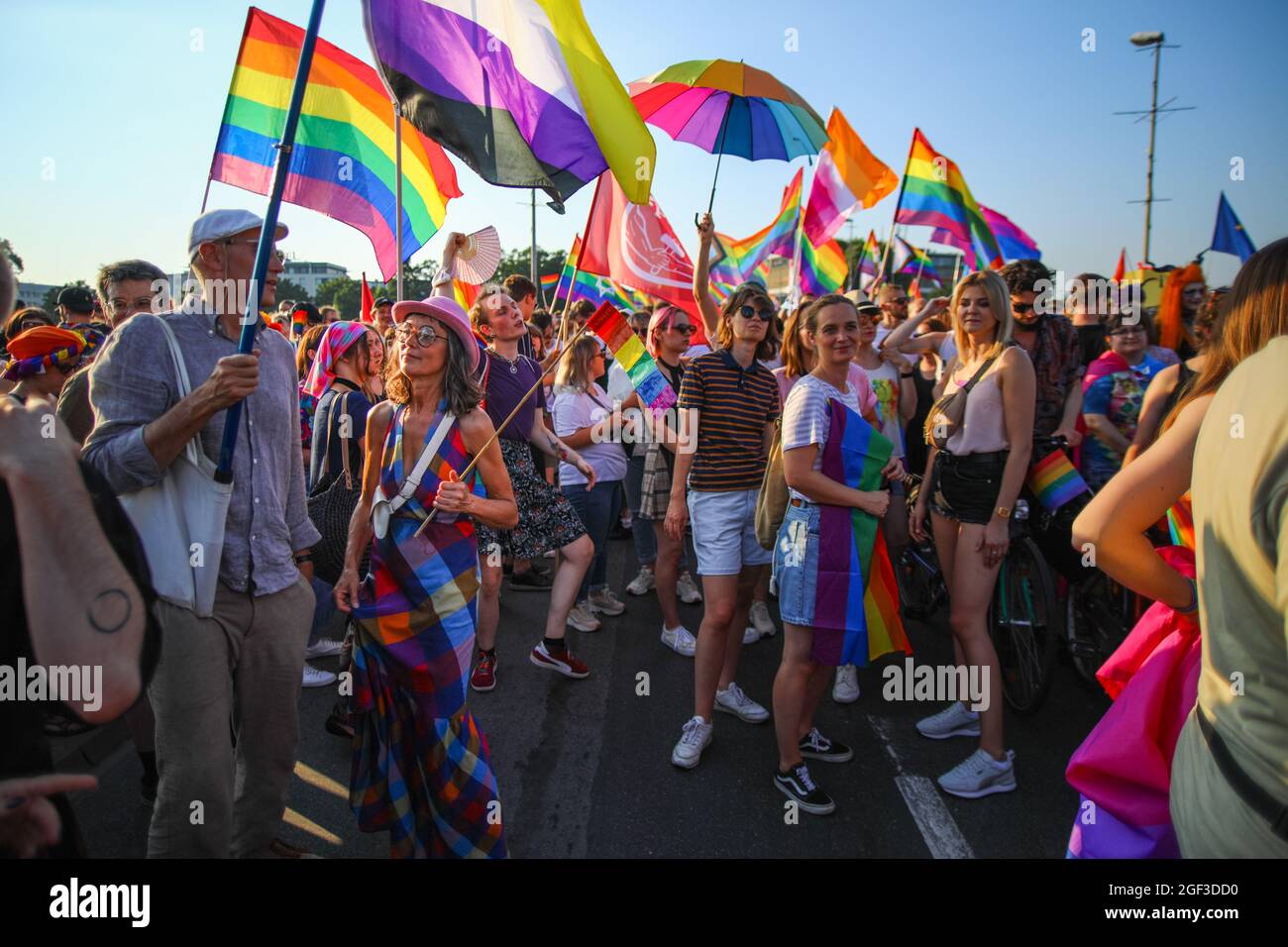 Members of Polish LGBTQ community are seen with rainbow flags during ...