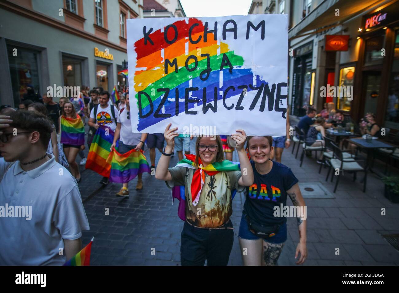 A female member of LGBT community is seen with a placard with a rainbow ...