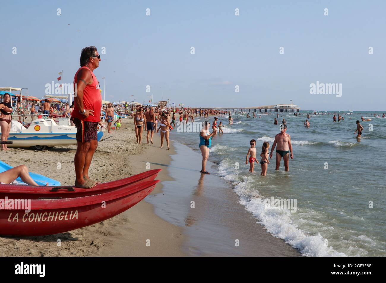 Versilia, Italy. 22nd Aug, 2021. Lifeguard on a lifeboat on a beach in ...