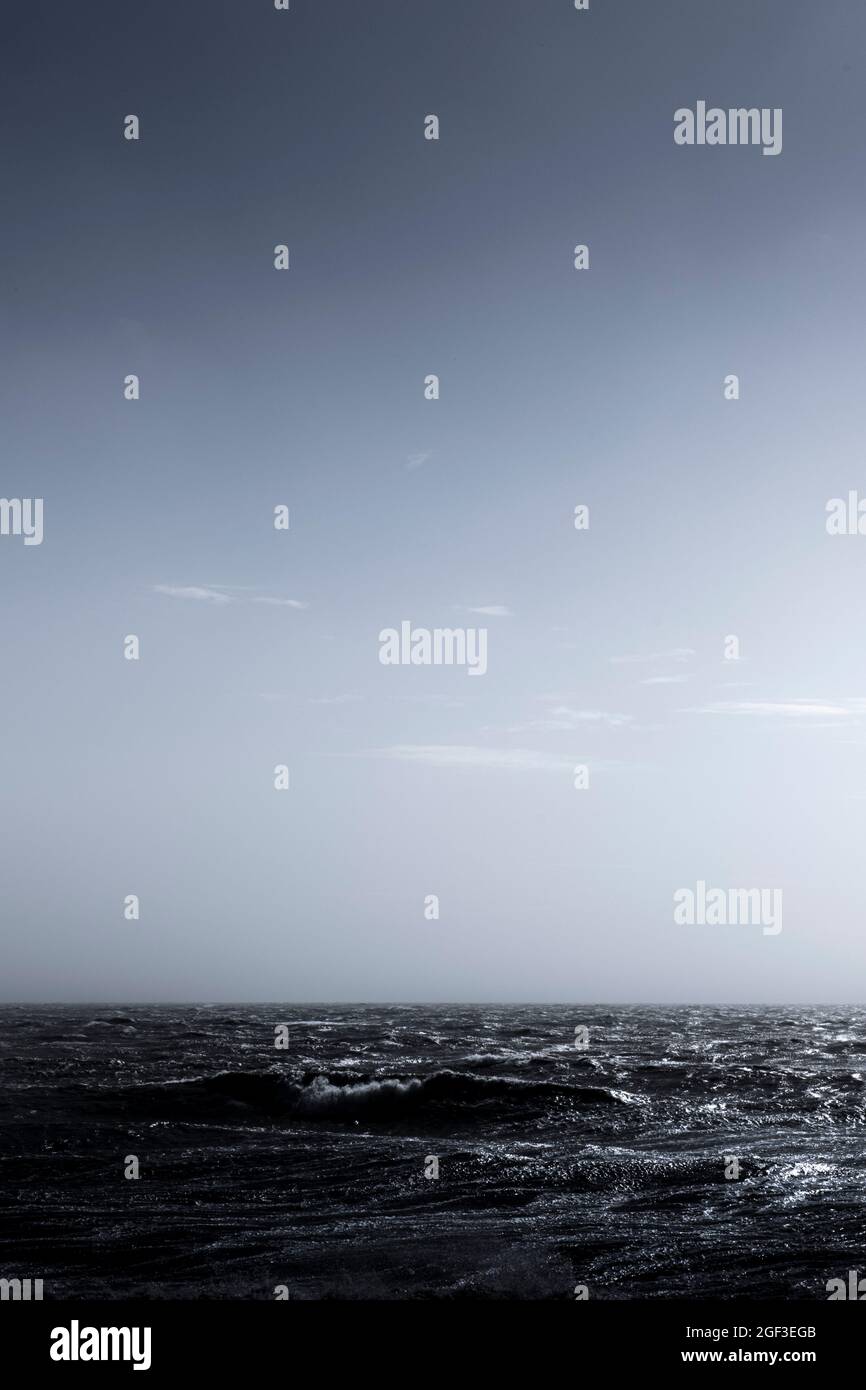 Moody Seacape with horizontal horizon Stock Photo - Alamy