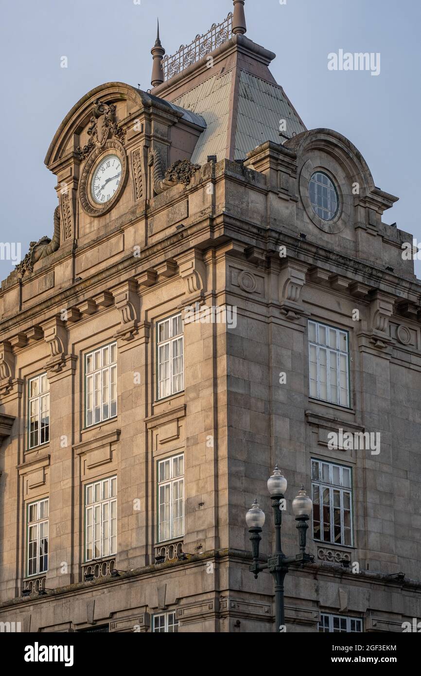 Stone building wall with windows and reflections in them Stock Photo ...