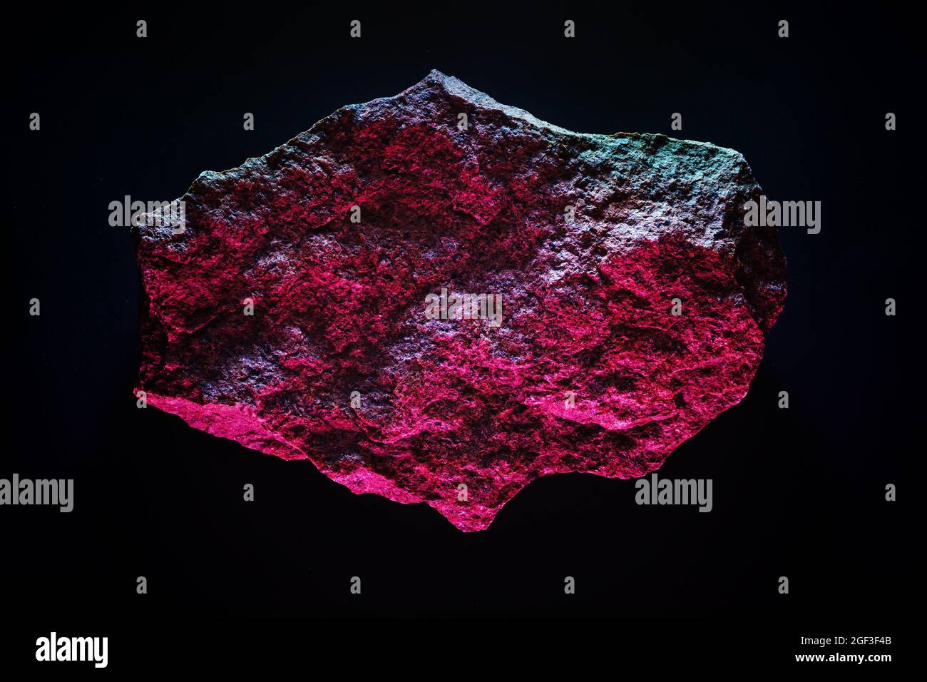 Red meteorite in dark space and neon lighting Stock Photo - Alamy