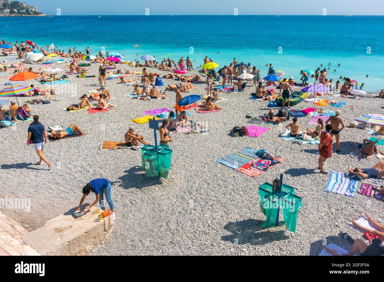 Nice, France, Crowd People on Vacation, Sunbathing, Mediterranean Sea ...