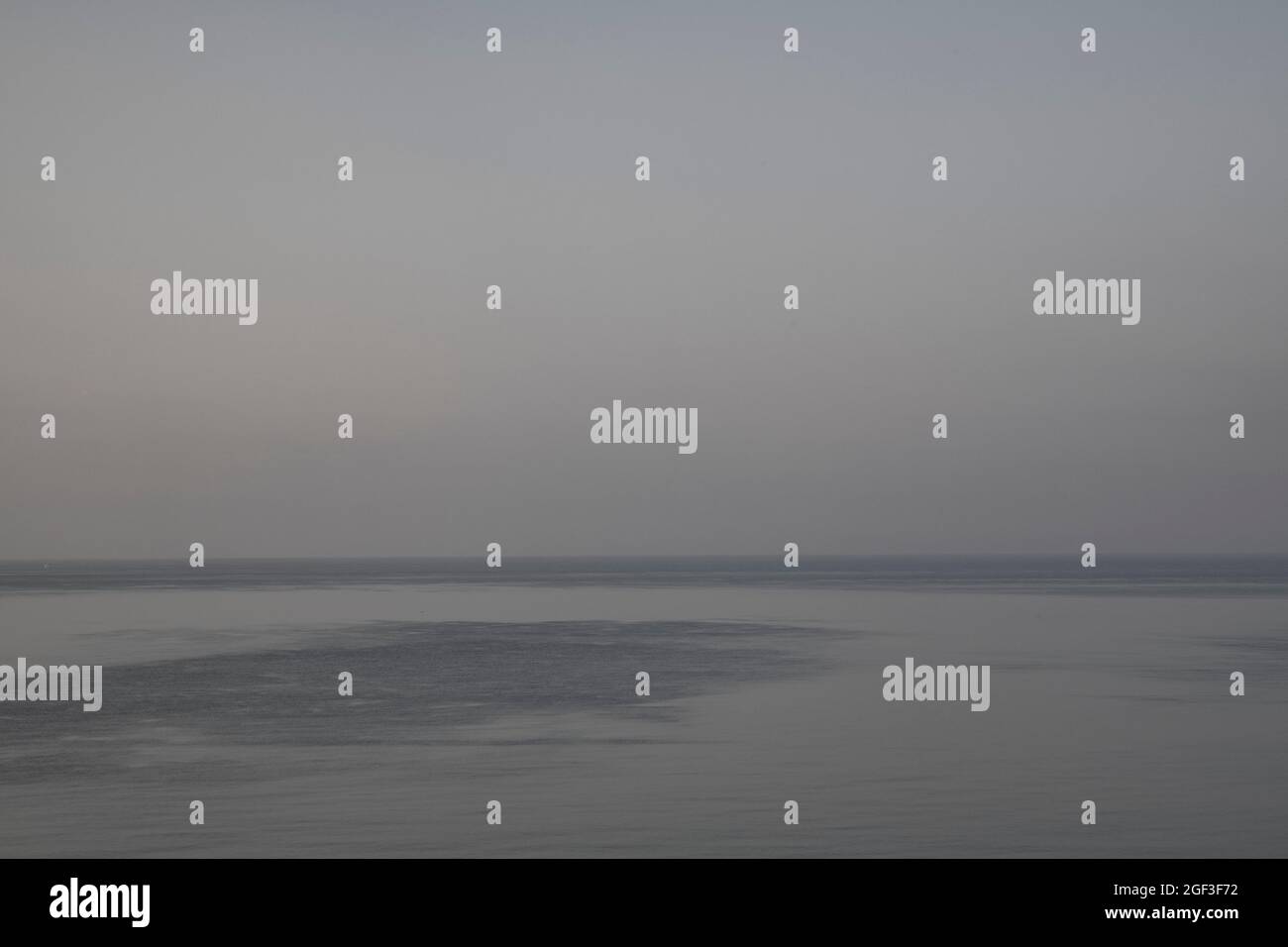 Moody Seacape with horizontal horizon Stock Photo - Alamy