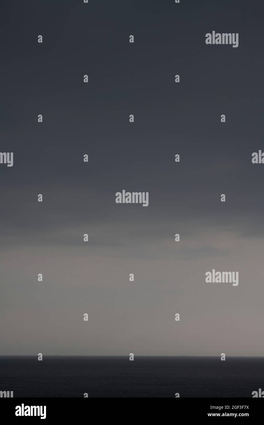 Moody Seacape with horizontal horizon Stock Photo - Alamy