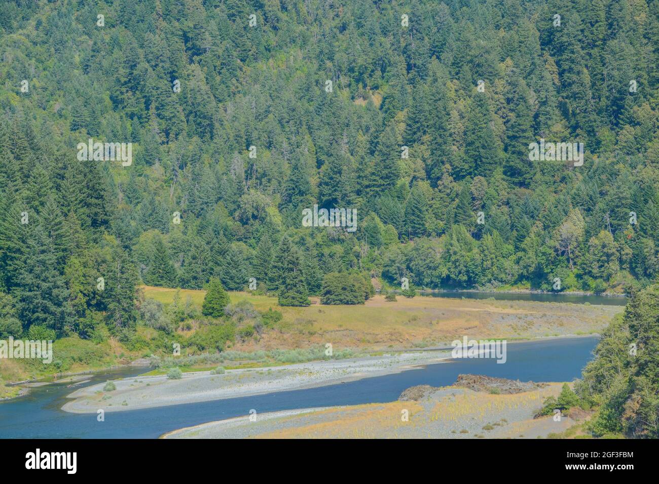 The Rogue River flowing through the Siskiyou National Forest in Oregon ...