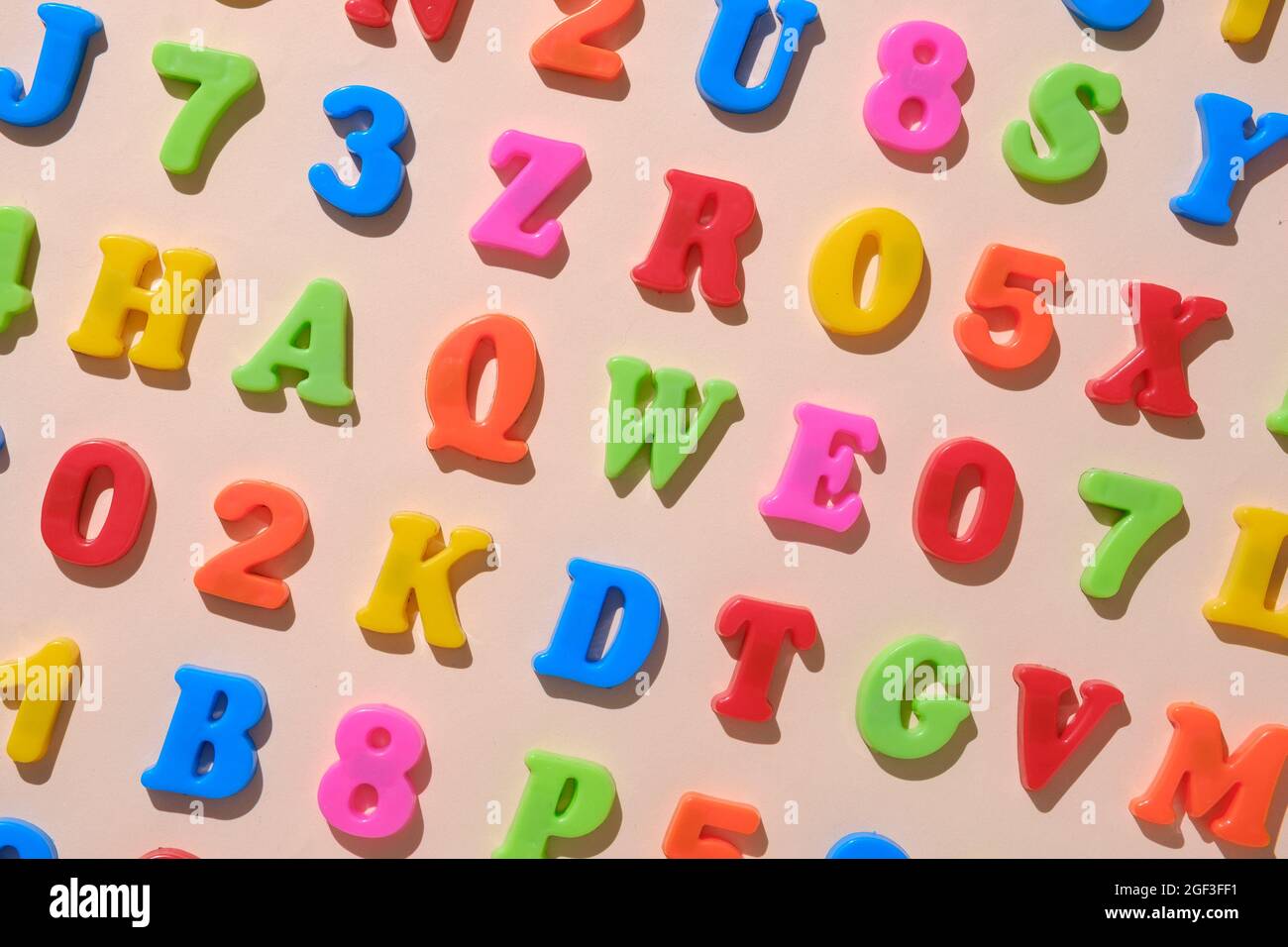 Alphabet letters and numbers as a concept for back to cheekbones ...