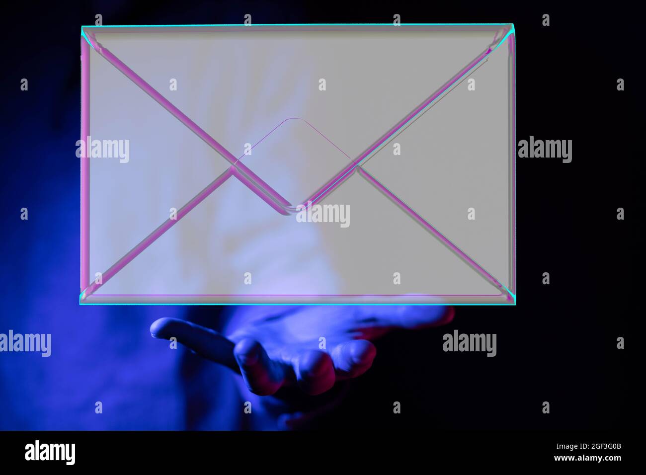 Email floating above a hand, electronic communication graphics concept ...