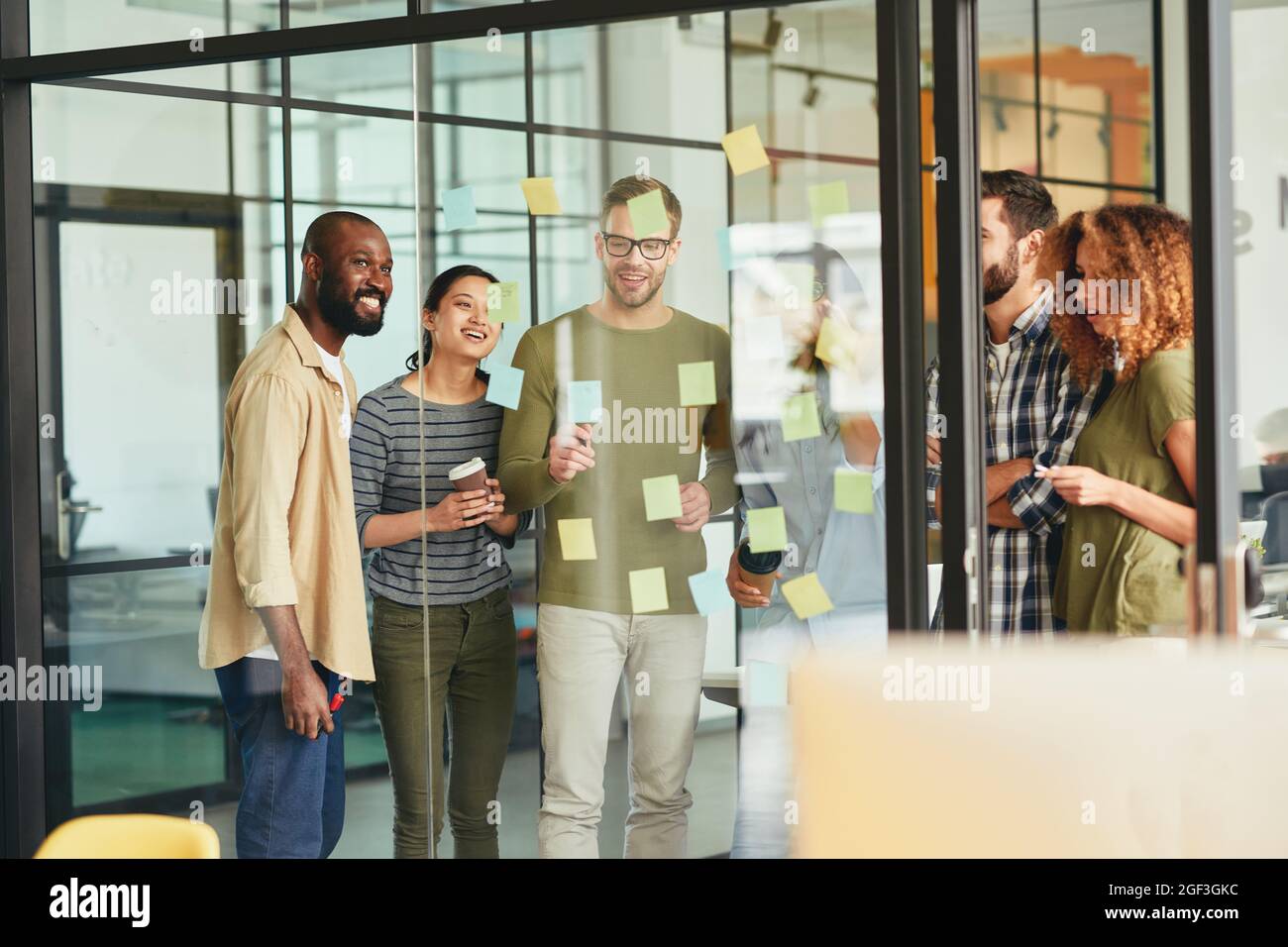Young people of different ethnicities doing training together Stock ...