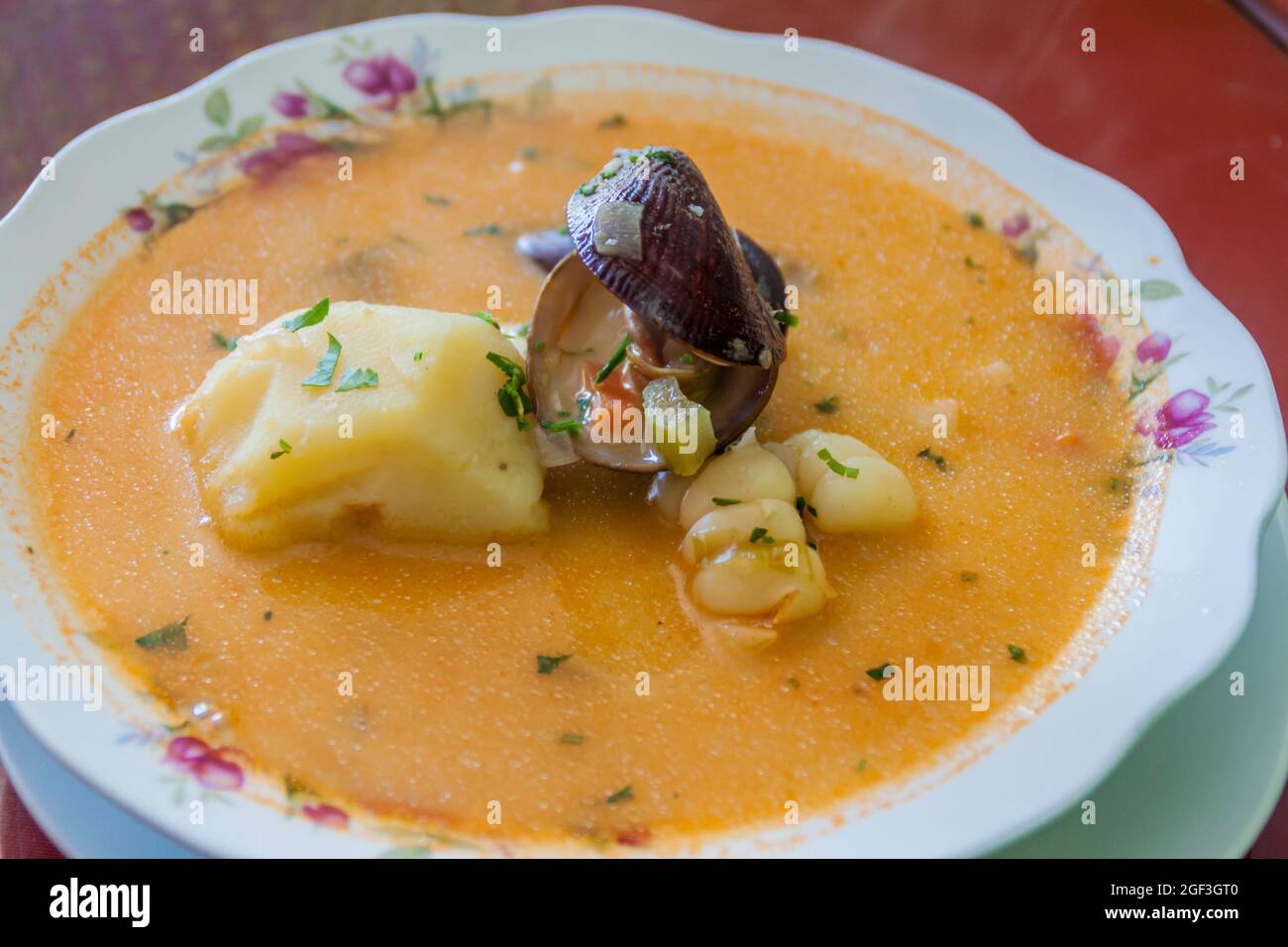 Clam soup in Peru Stock Photo - Alamy