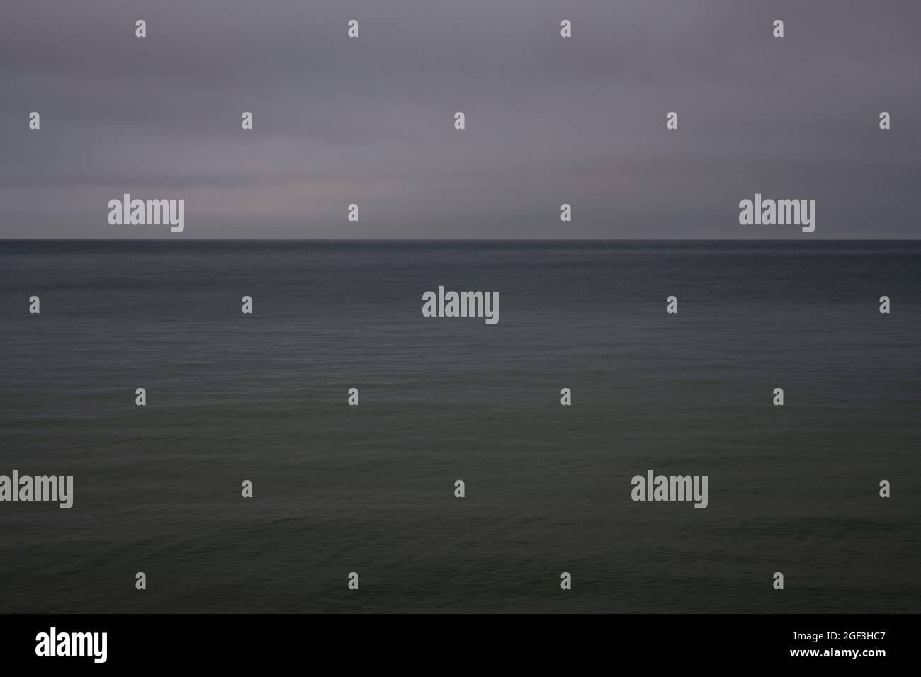 Moody Seacape with horizontal horizon Stock Photo - Alamy