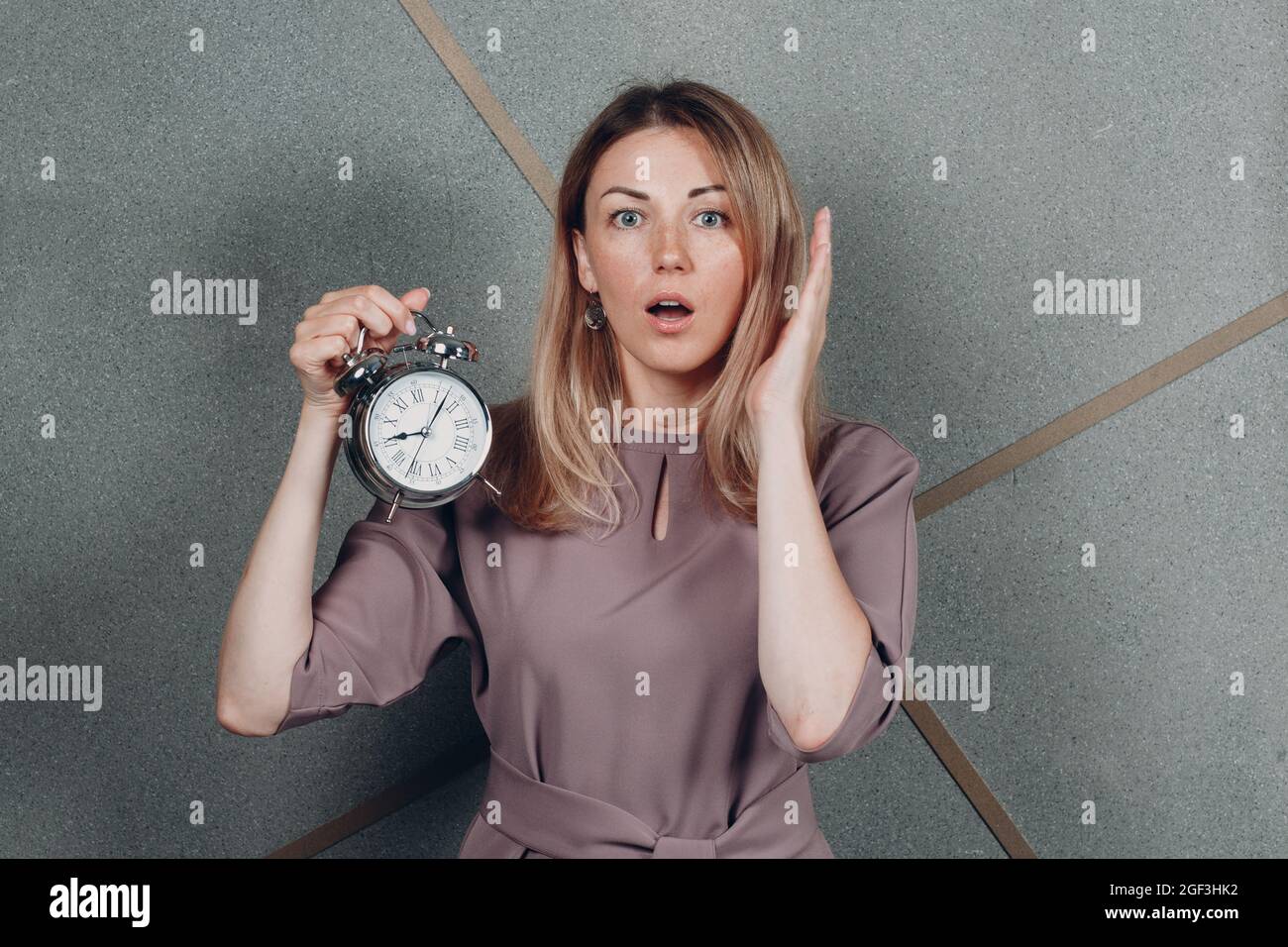 Business woman young adult coach with clock watch at office portrait ...