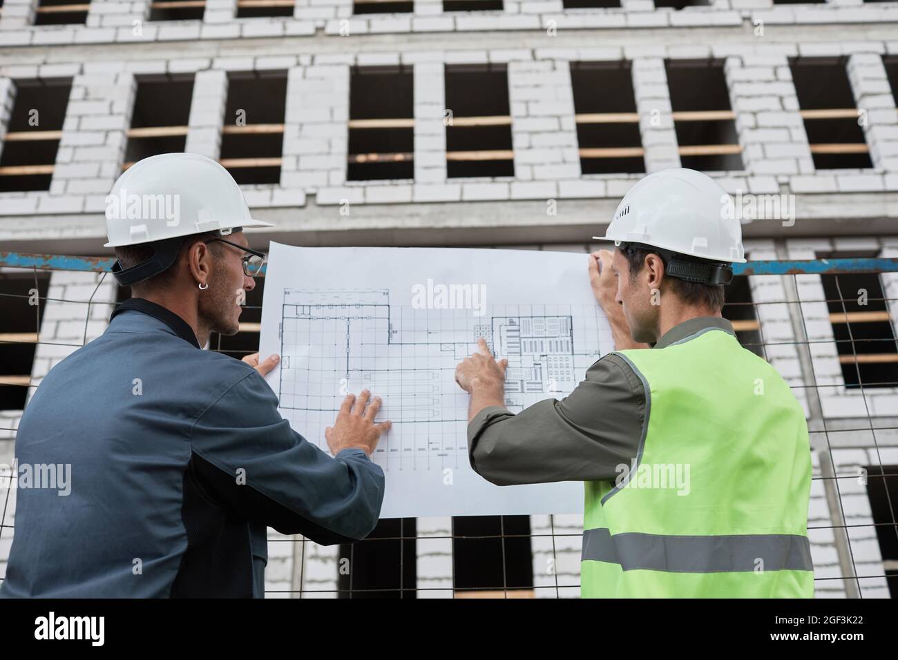 Two engineers plans hi-res stock photography and images - Alamy