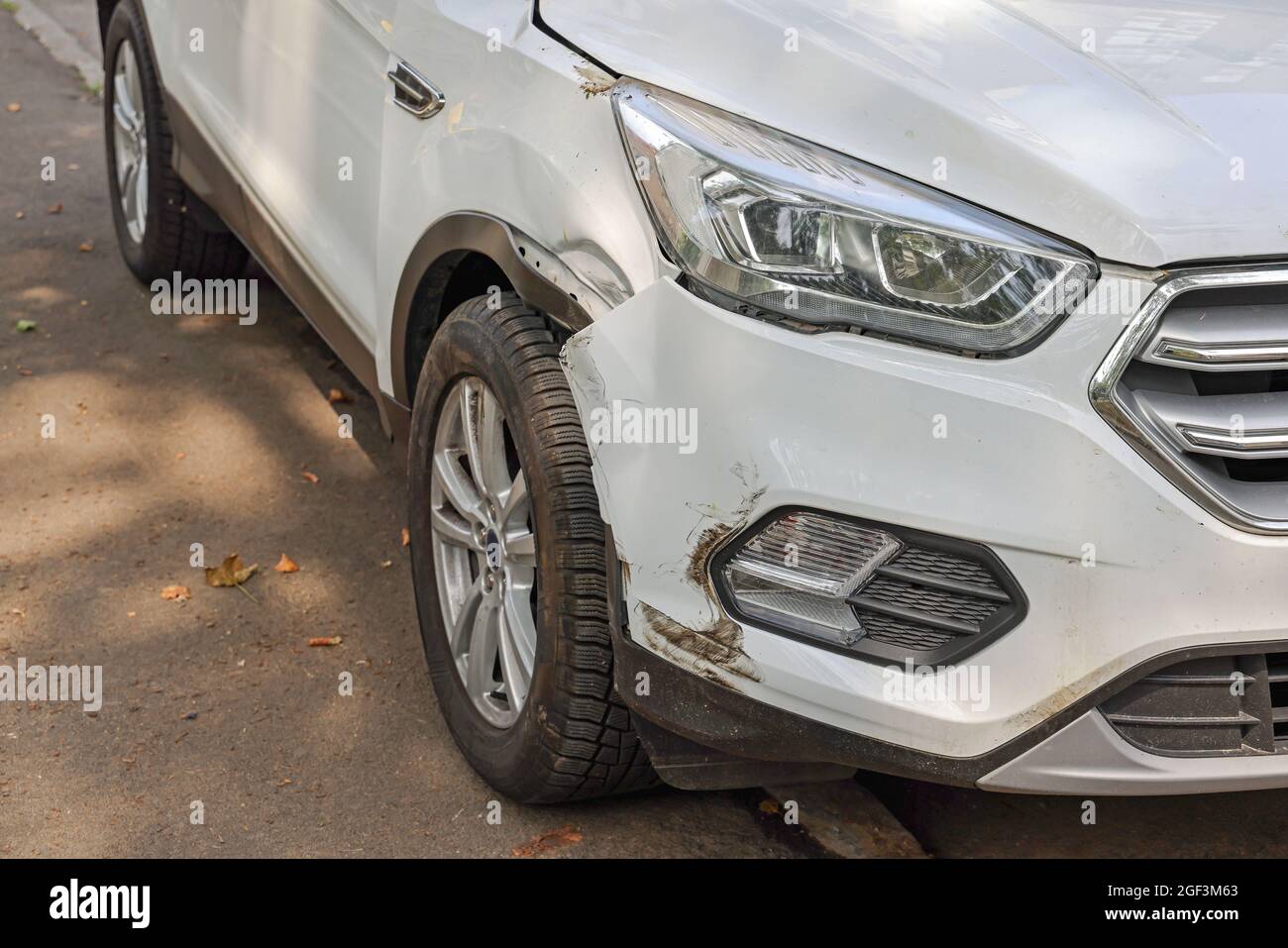 Small Accident Damage at FrontBumper of New White Vehicle Stock Photo ...