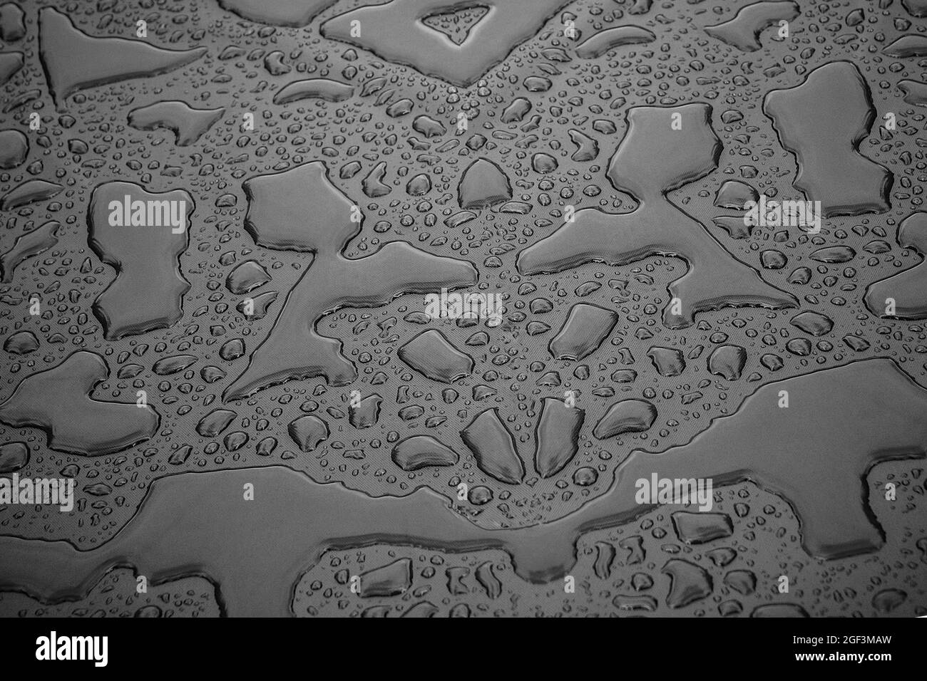 rainwater water on a waterproof fabric Stock Photo - Alamy