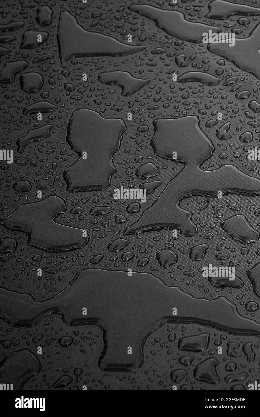 water droplets on black waterproofed fabric Stock Photo - Alamy