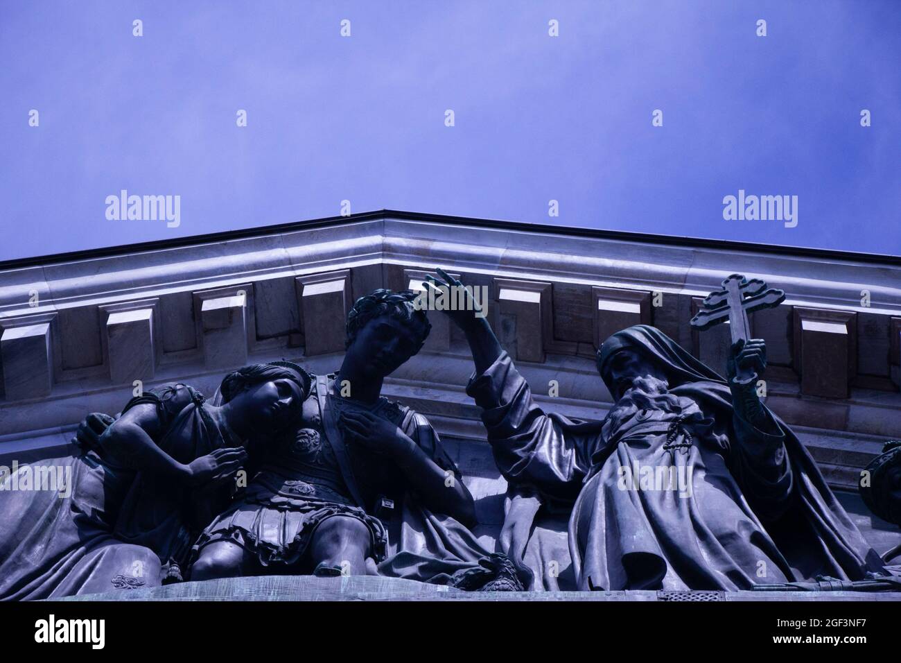 Low angle shot of a statue of people on St. Isaac's Cathedral, Saint ...