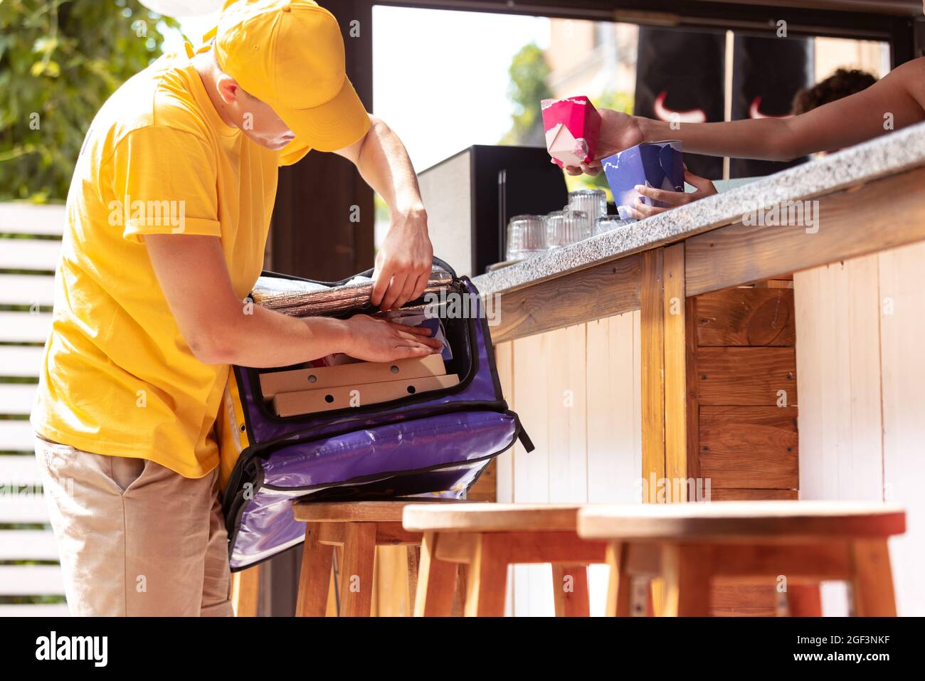 Picking up order hi-res stock photography and images - Alamy