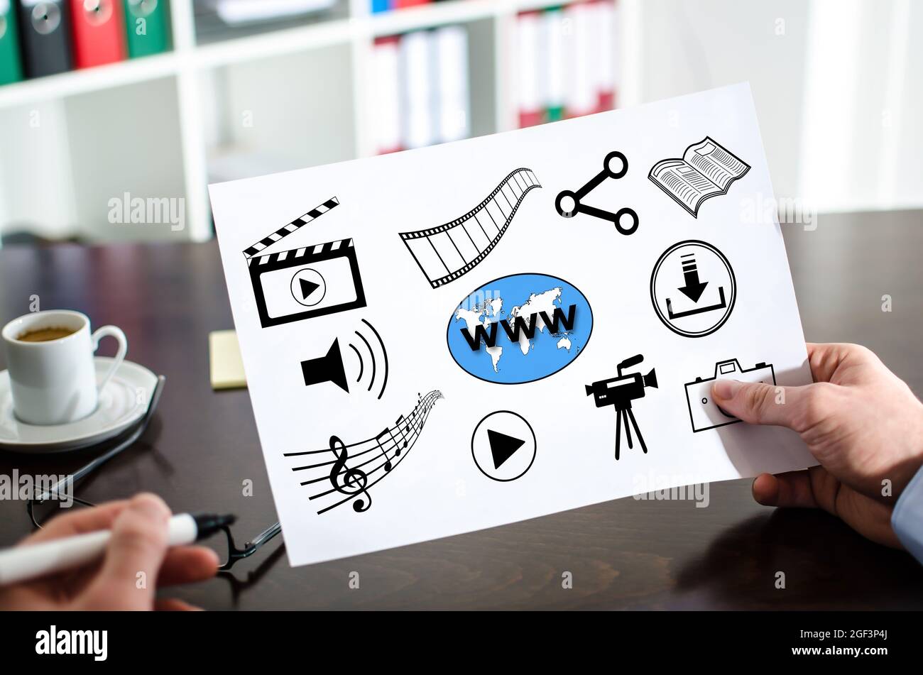 Hand holding a paper showing social information sharing concept Stock ...