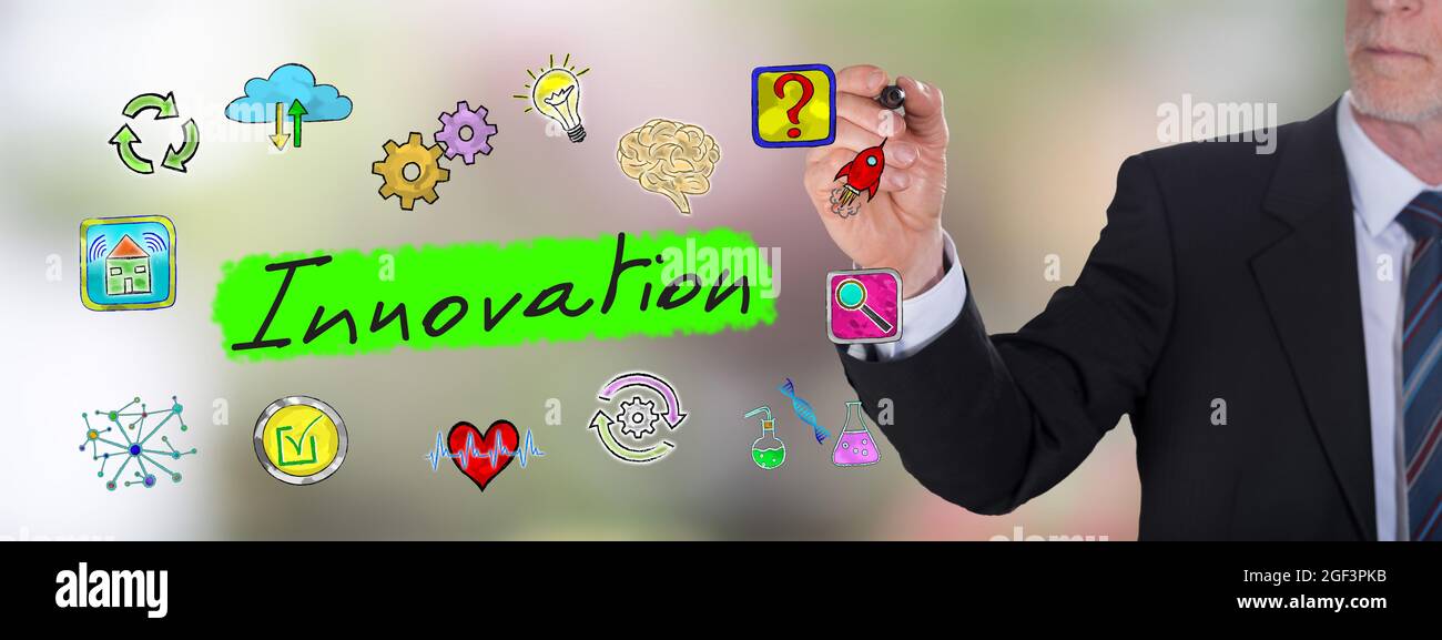 Businessman drawing an innovation concept Stock Photo - Alamy
