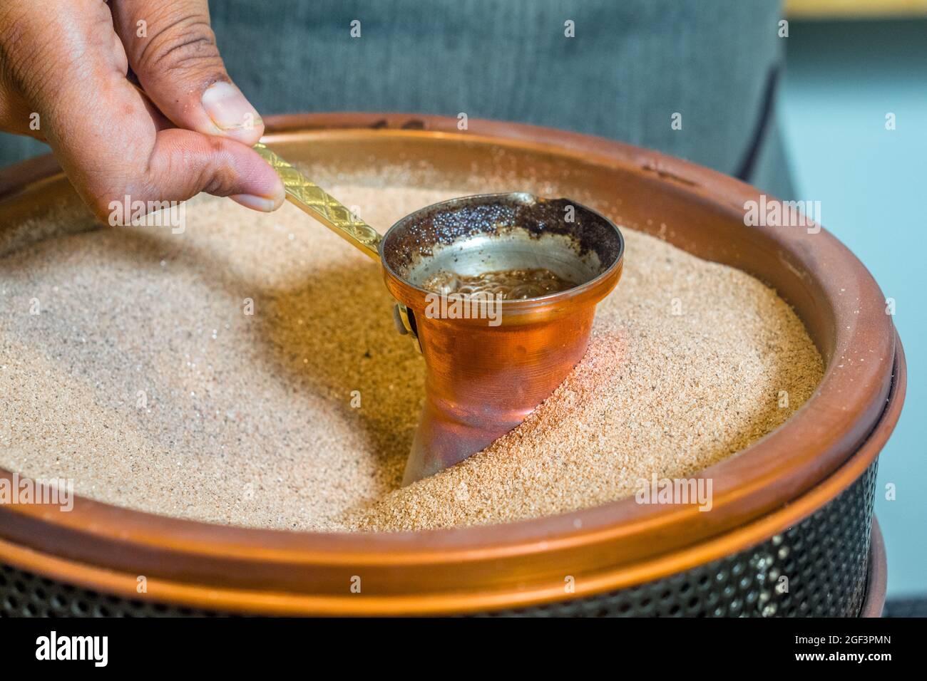 Closeup shot of a Turkish coffee sand machine with a jar Stock Photo ...