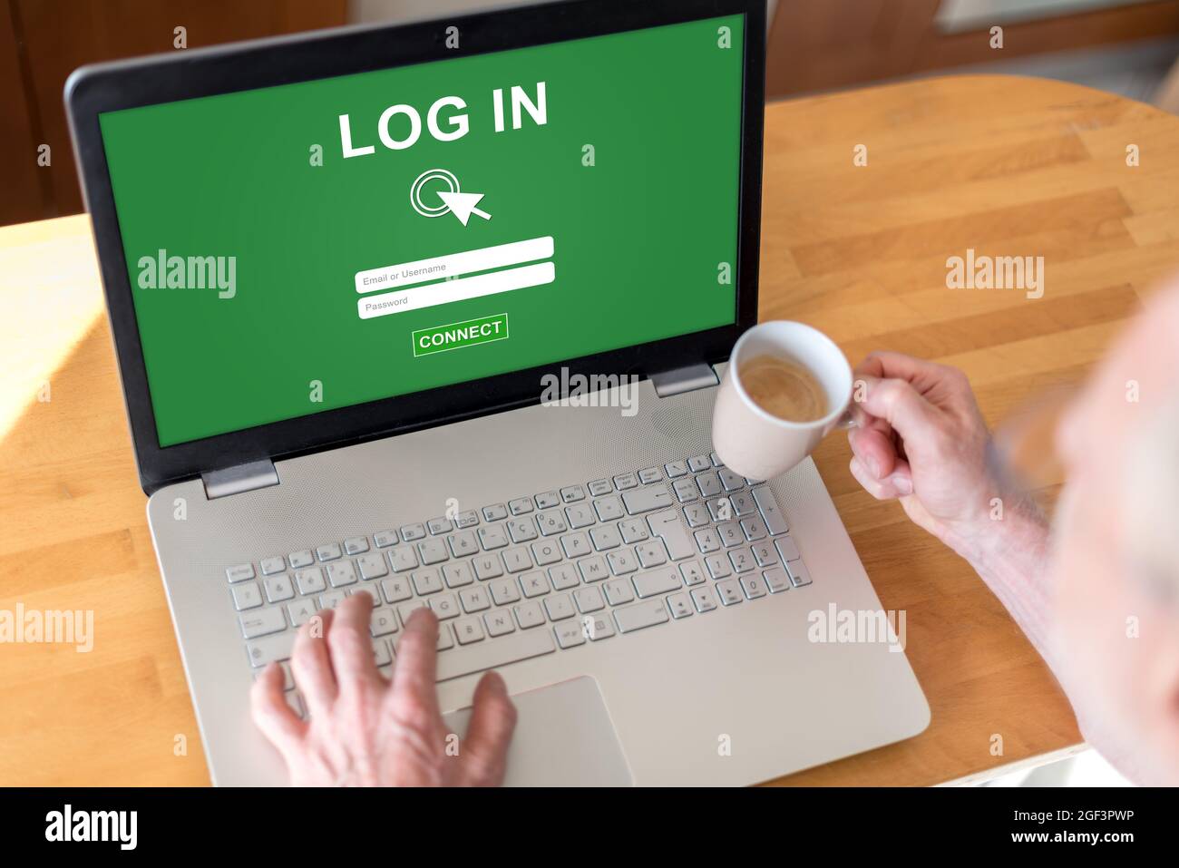 Man using a laptop with login concept on the screen Stock Photo - Alamy