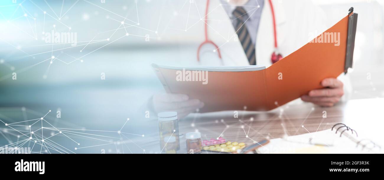 Doctor reading a medical report in office; multiple exposure Stock ...