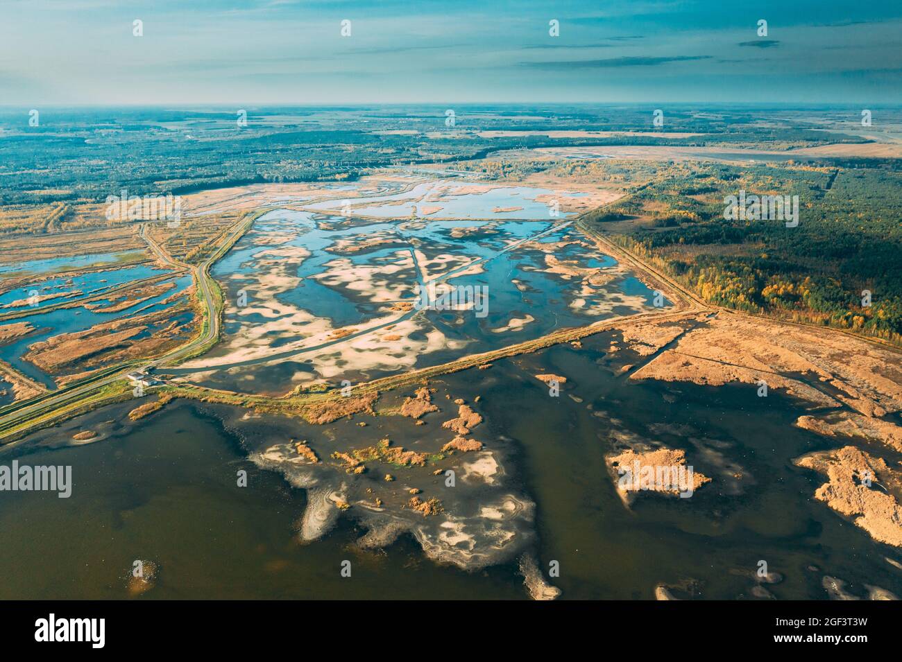 Belarus. Aerial View Of Road Through Ponds In Autumn Landscape. Ponds ...