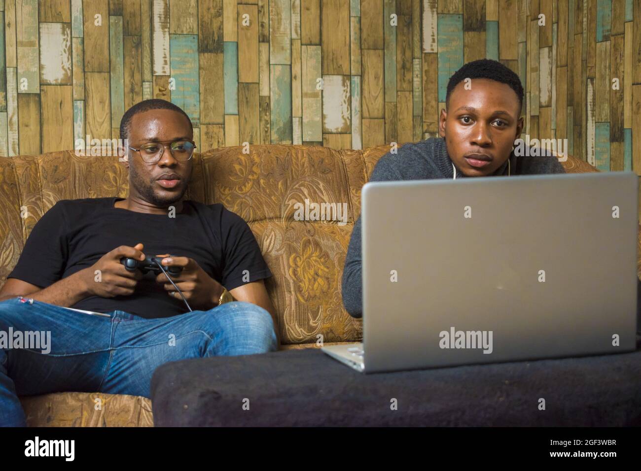 Two guys playing video games hi-res stock photography and images - Alamy