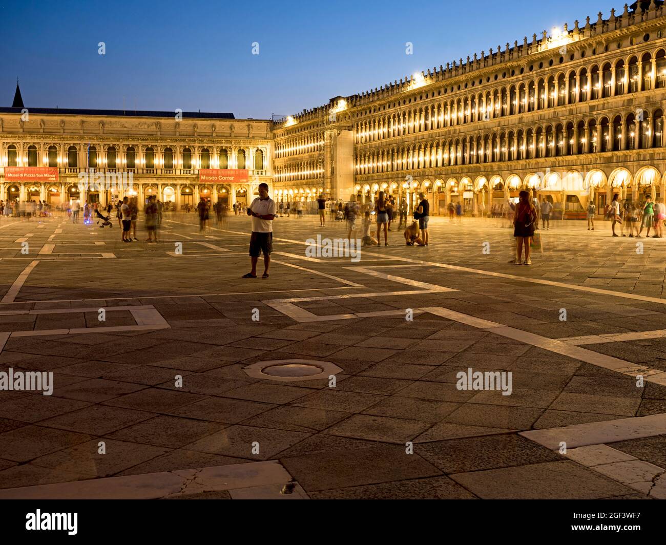 Tourists stroll along San Marco in August 2021 as travelling has become ...