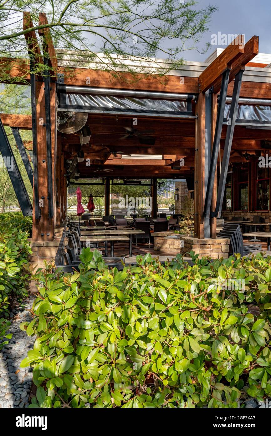 View looking into an outdoor restaurant before opening Stock Photo - Alamy