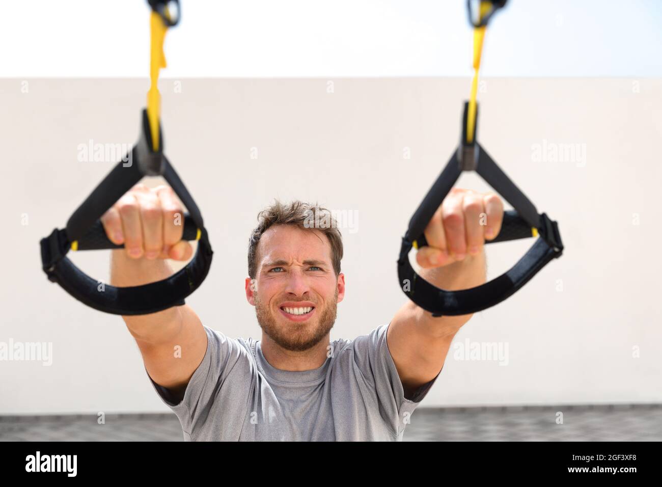 Suspension straps training arms biceps muscles workout fitness man ...