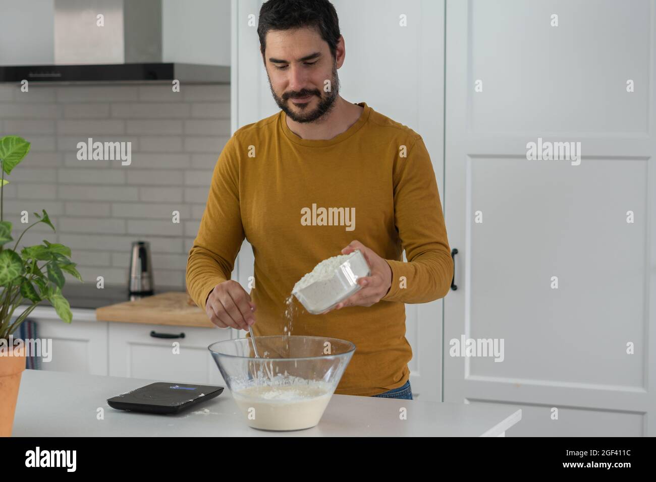 young man making bread Stock Photo - Alamy