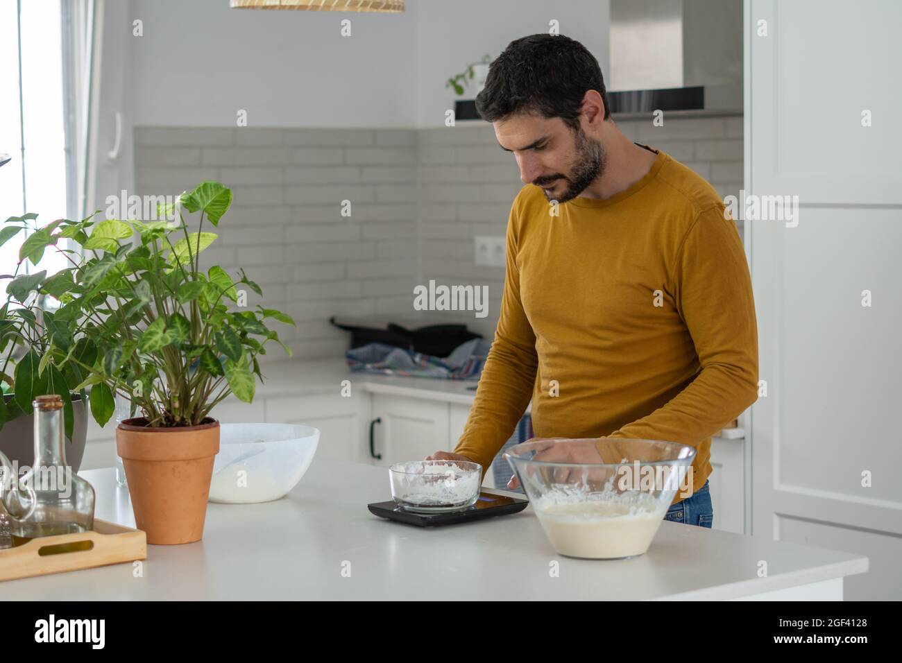 young man making bread Stock Photo - Alamy