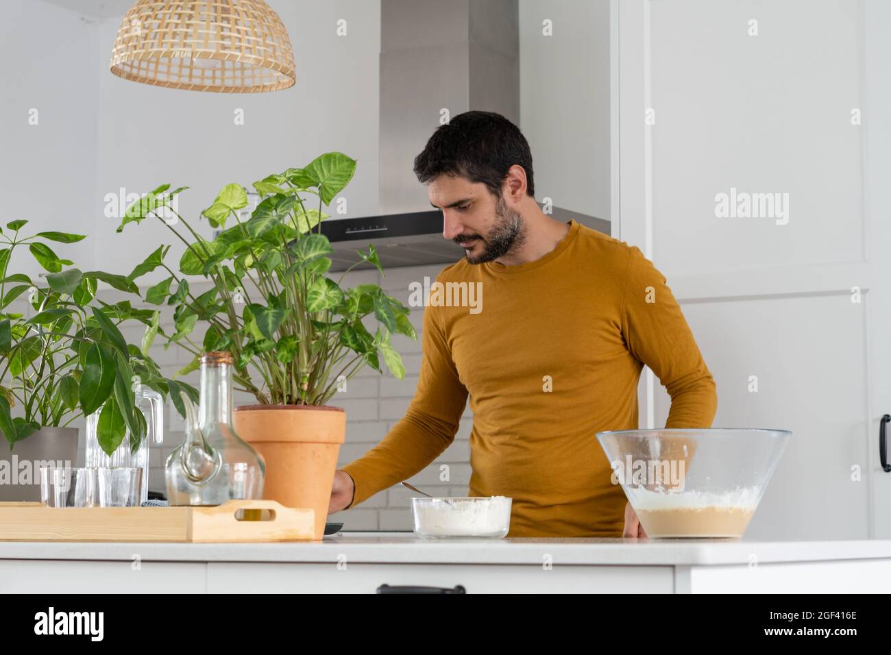young man making bread Stock Photo - Alamy
