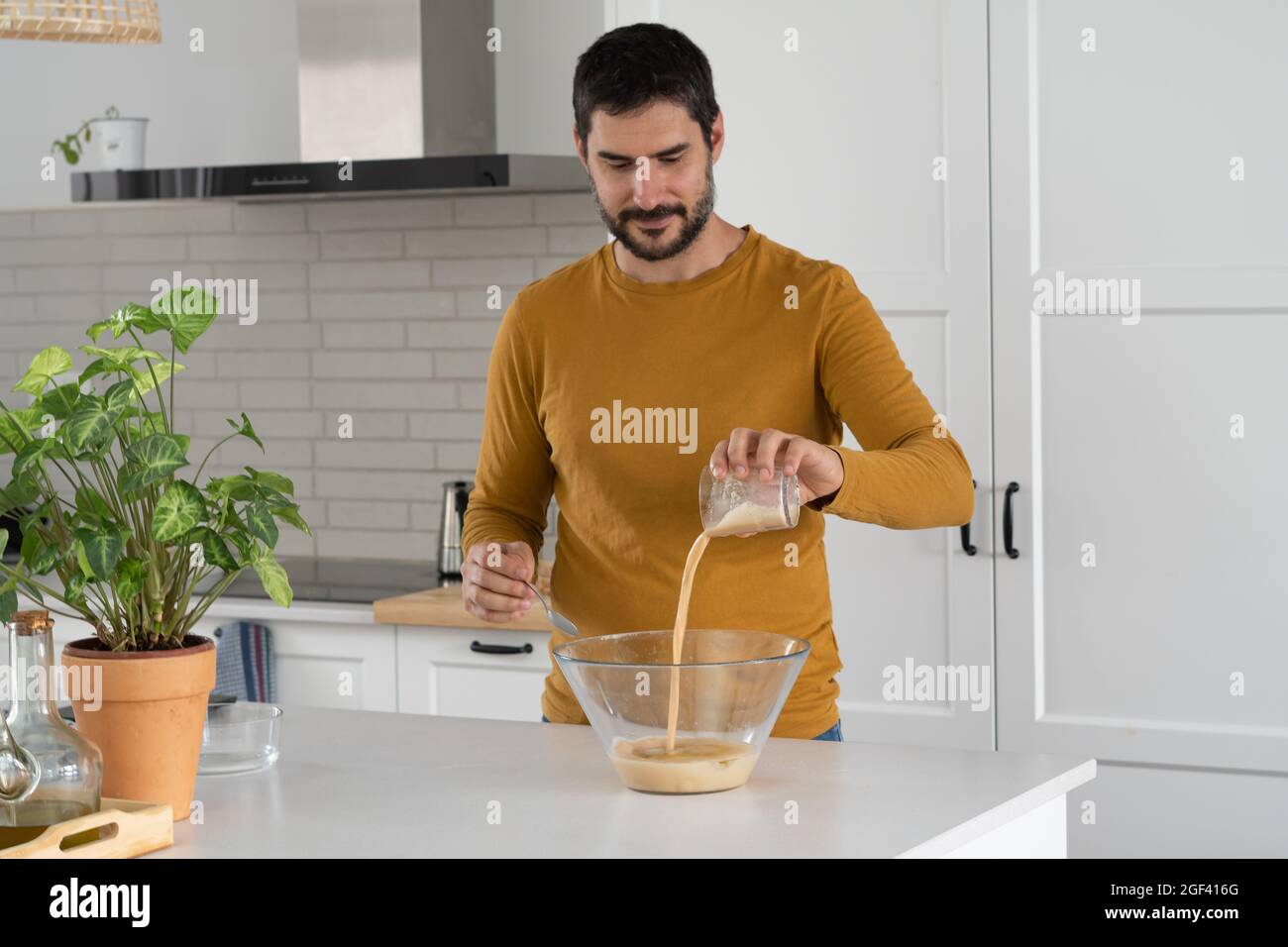 young man making bread Stock Photo - Alamy