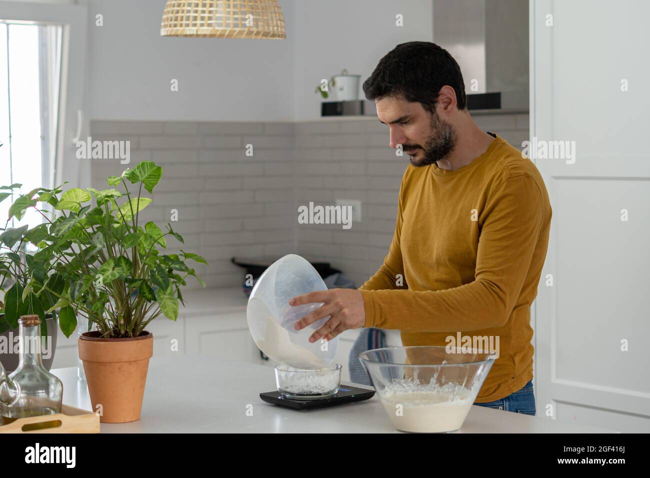 young man making bread Stock Photo - Alamy