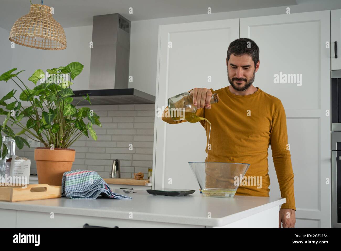 young man making bread Stock Photo - Alamy