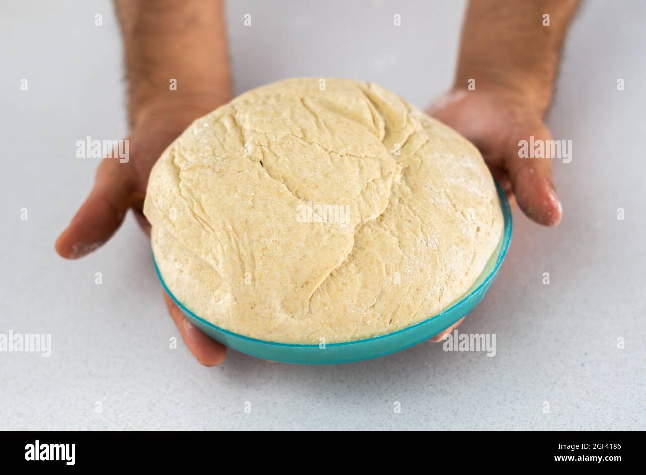 young man making bread Stock Photo - Alamy