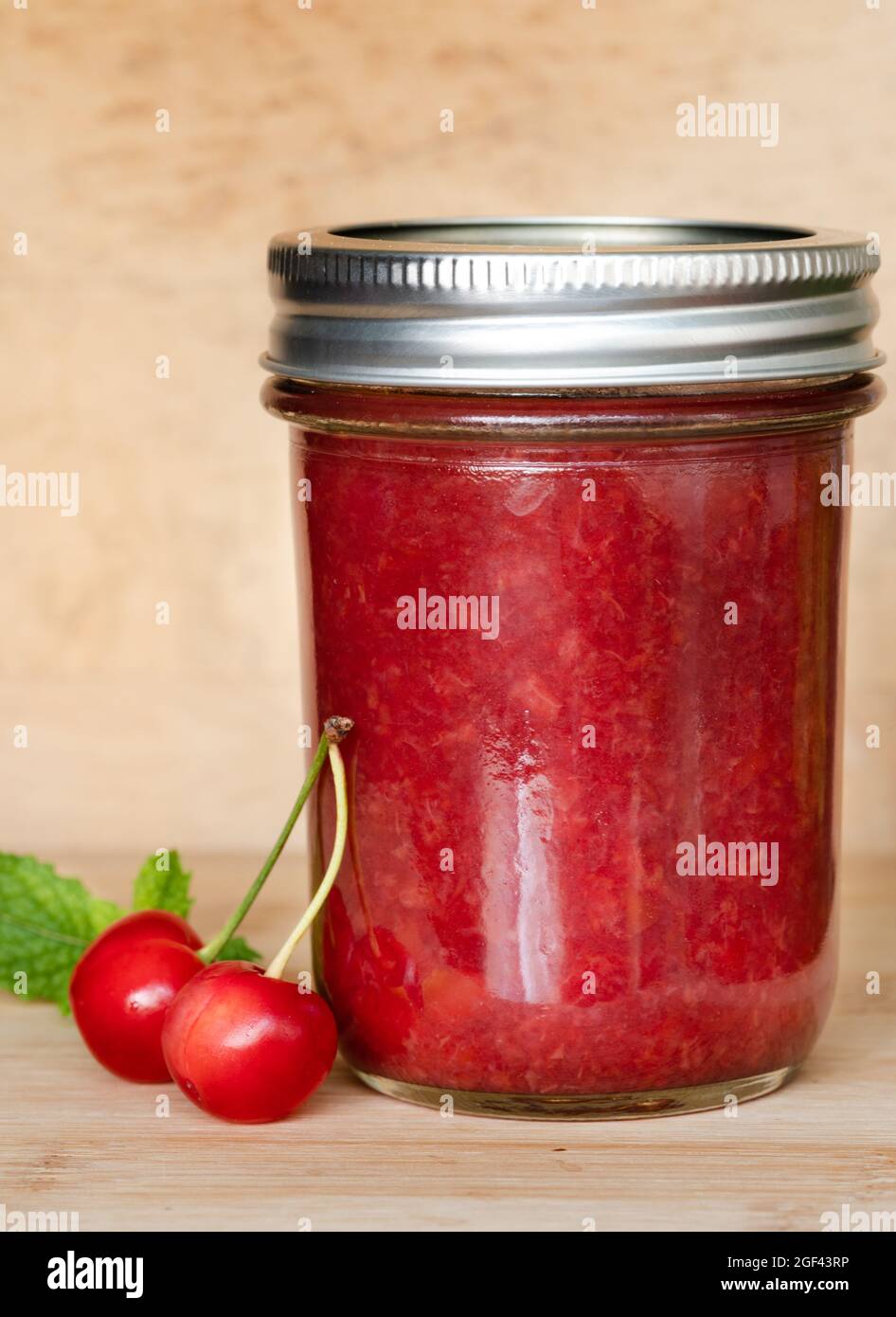 Jar of Jam with Red Cherries Stock Photo - Alamy