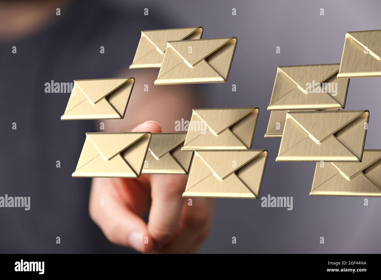 Hand touching floating letter icons Stock Photo - Alamy