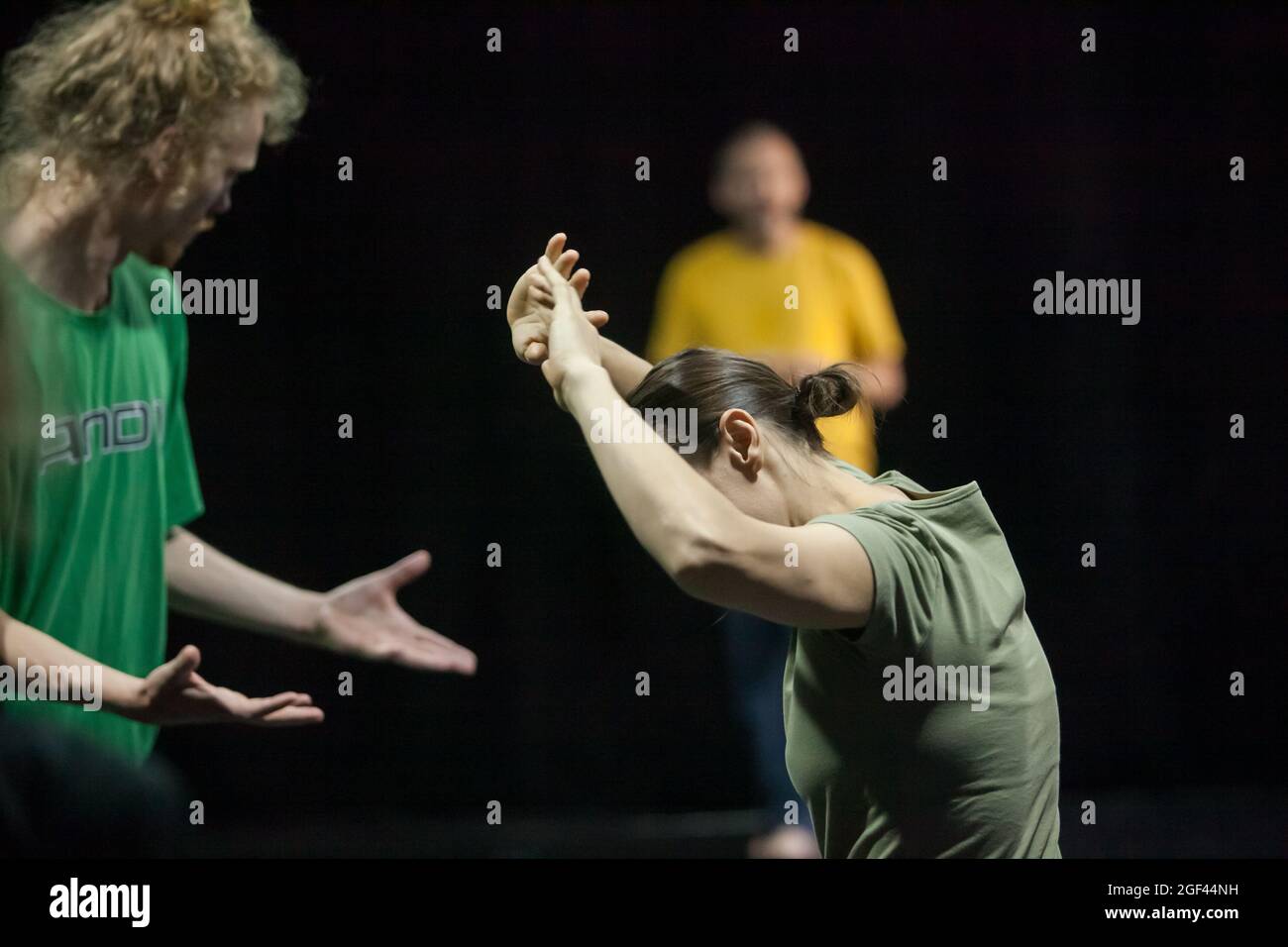 two dancers move in contact improvisation performance Stock Photo - Alamy