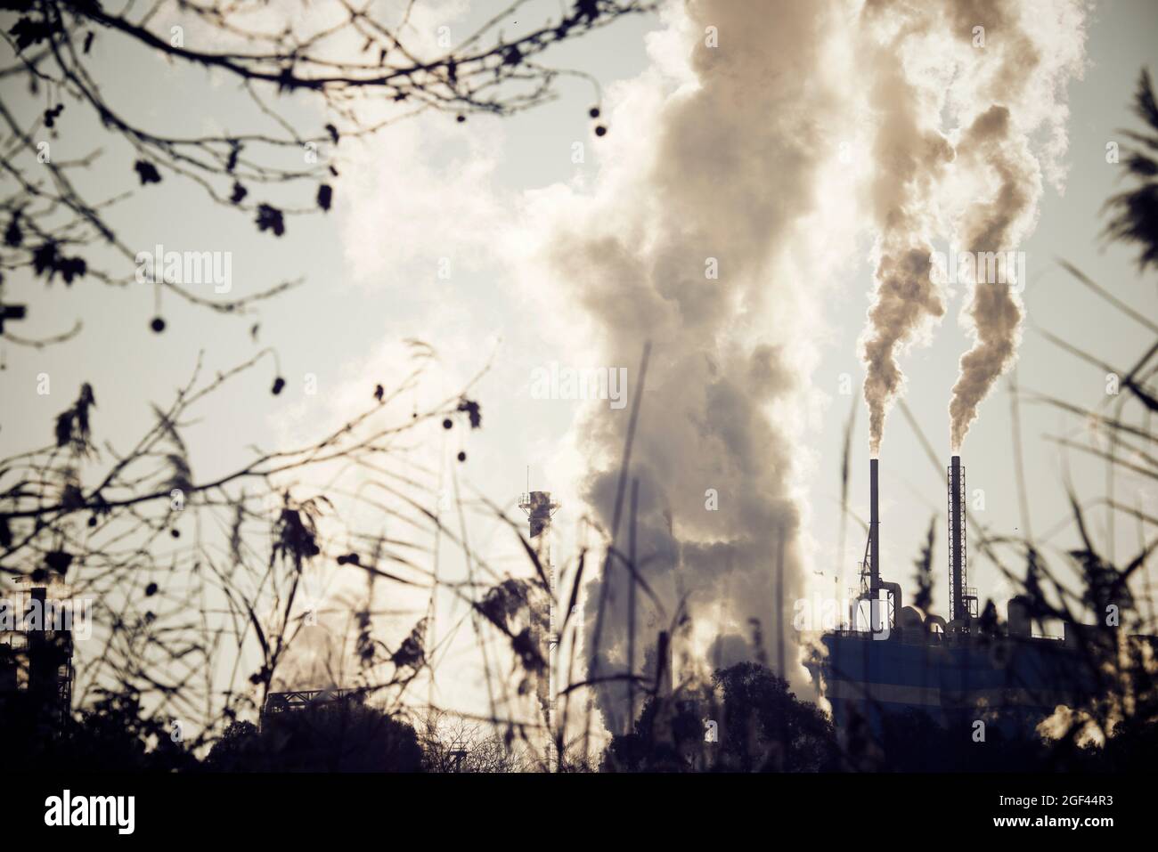 Factory silhouette pollution smokestacks hi-res stock photography and ...