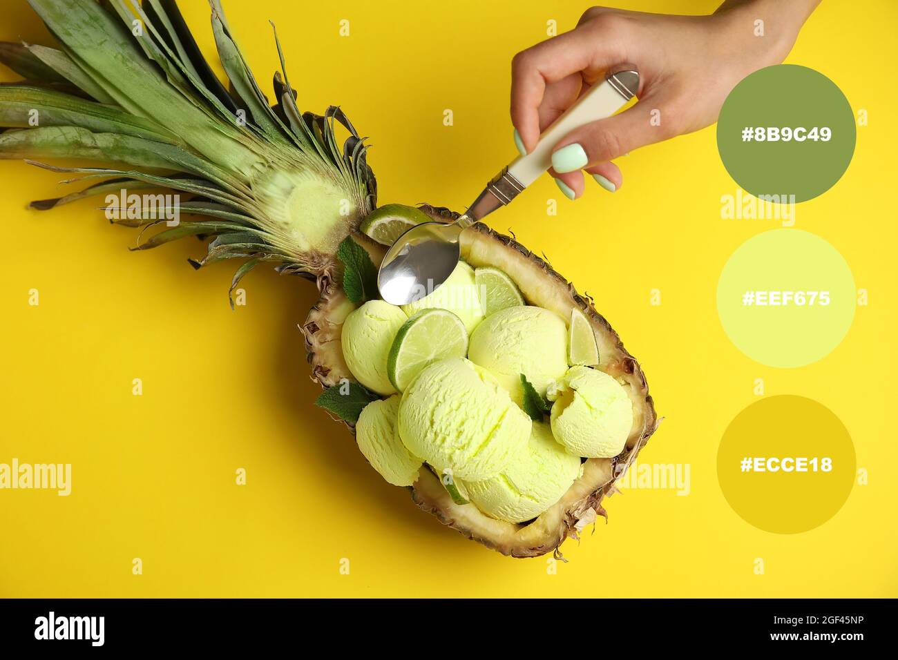 Woman eating tasty pineapple ice cream on yellow background. Different ...